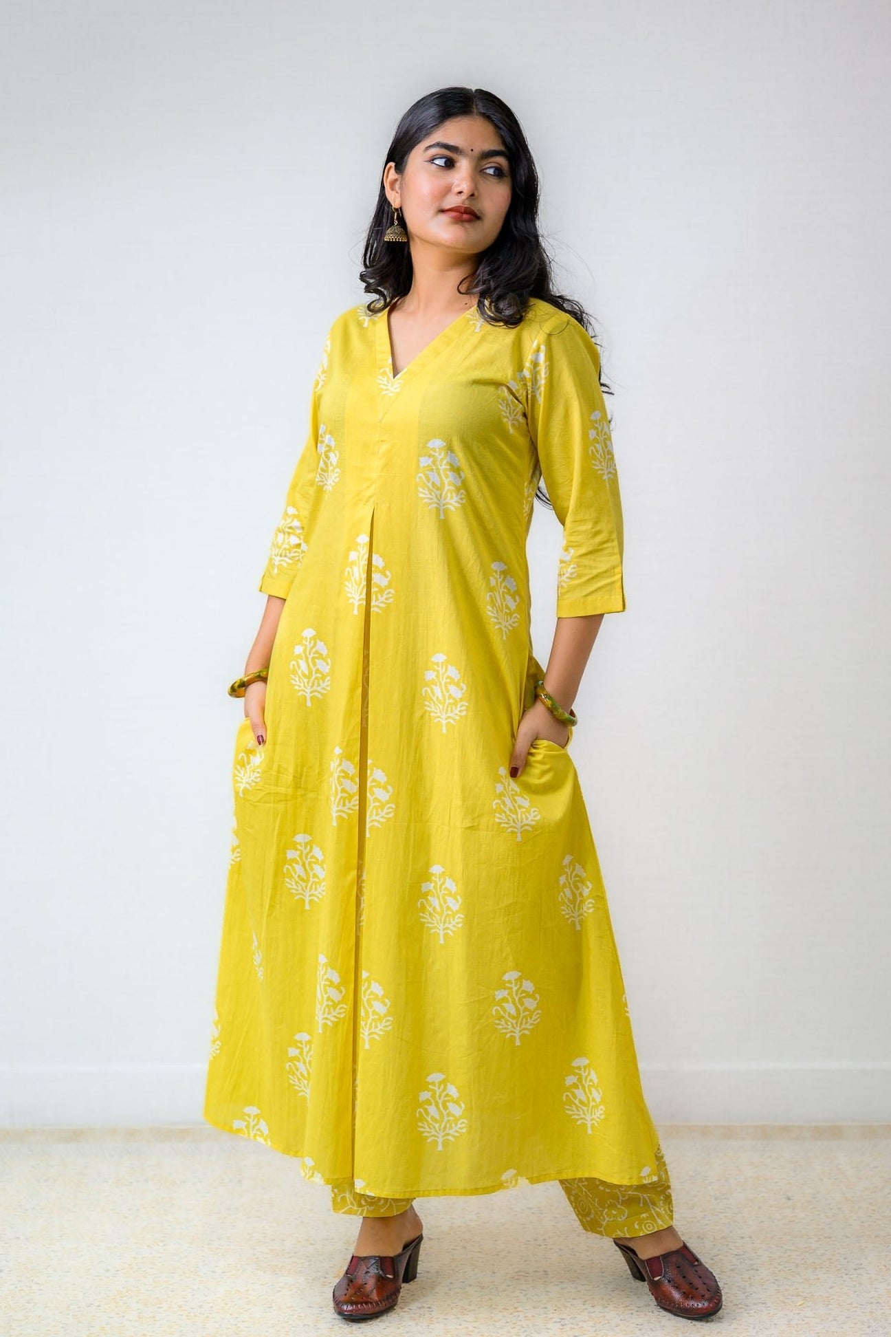 Jamanthi on Yellow Sanganeri Box Pleated Cotton Kurta- Lobha Deepthis